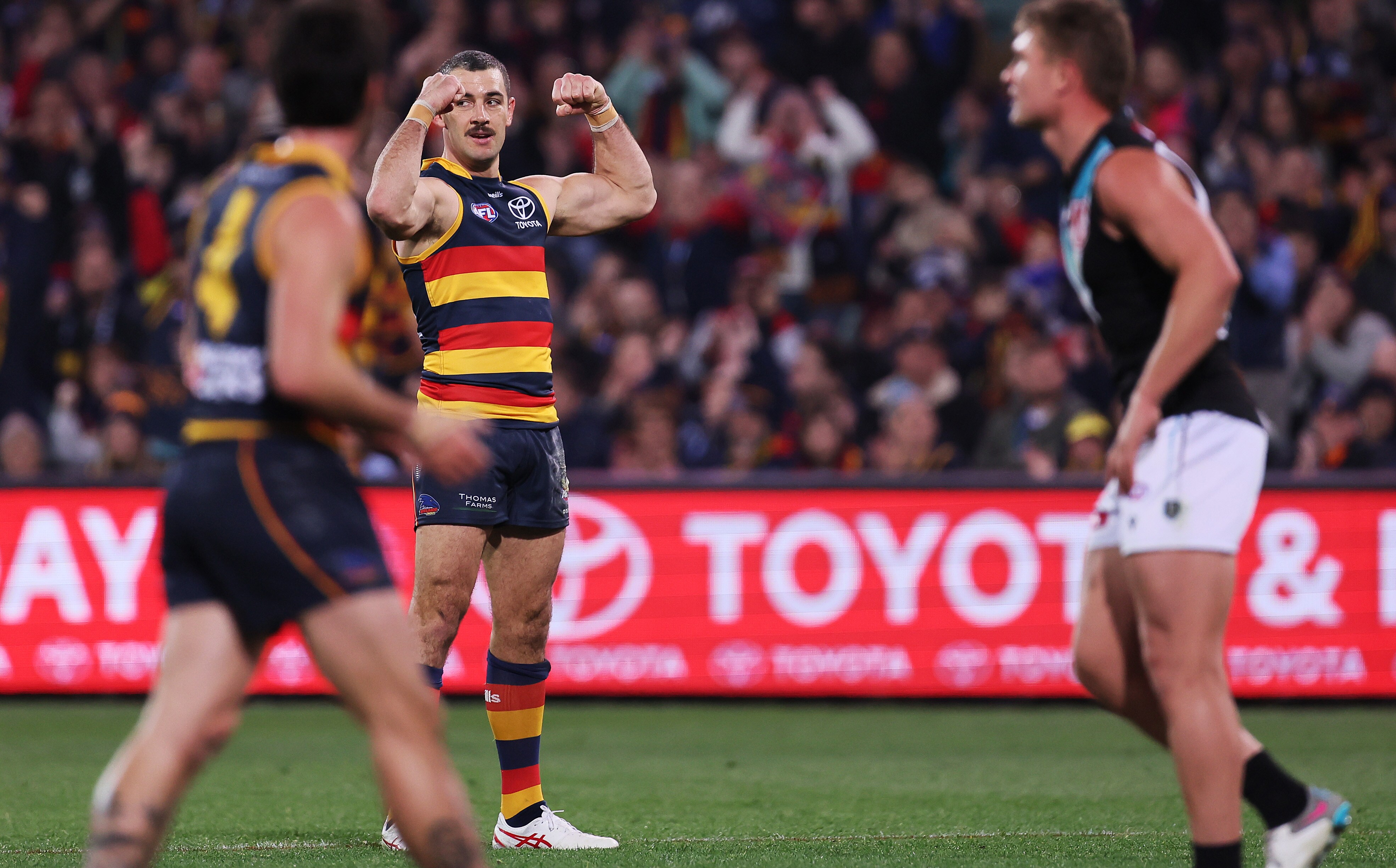 Walker equals Showdown record as inspired Crows defeat Power